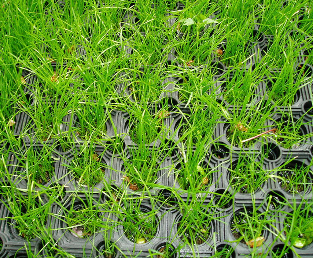 Grass Safety Mats for commercial swing parks | Safety surfacing